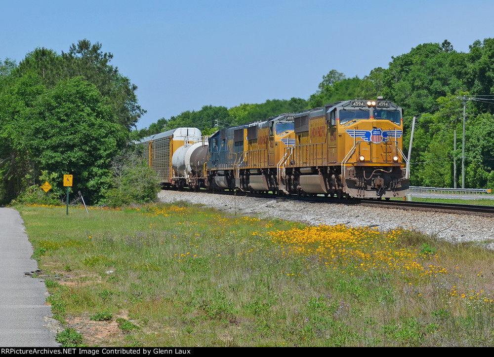 UP 4594 leads an eastbound mixed freight